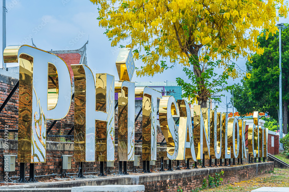 Text letter light Phitsanulok city and Golden Cassia fistula flowers at ...