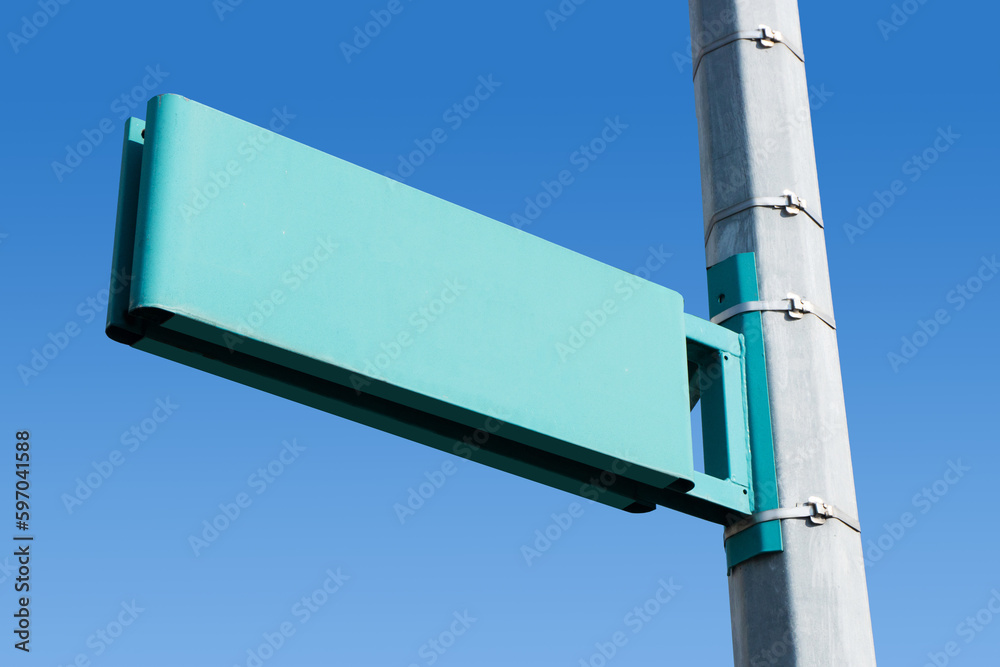 Street name pole. Signpost isolated on nlue sky. Empty copy space ...