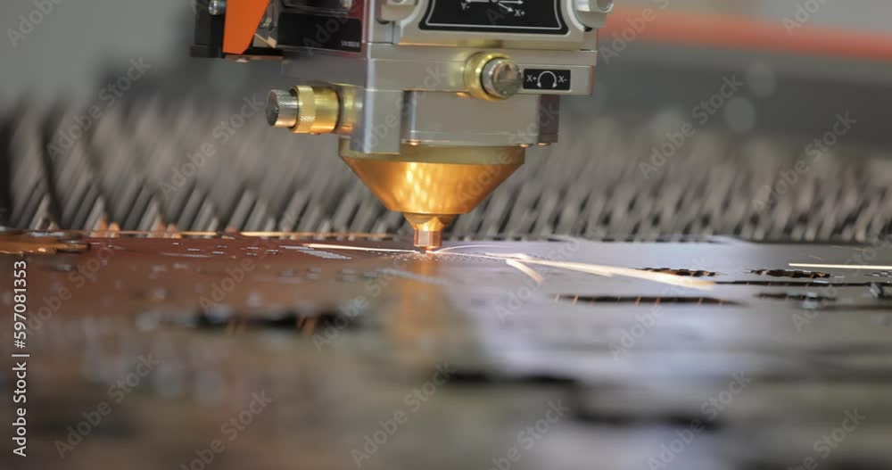 CNC Laser cutting of metal, modern industrial technology. Small depth ...