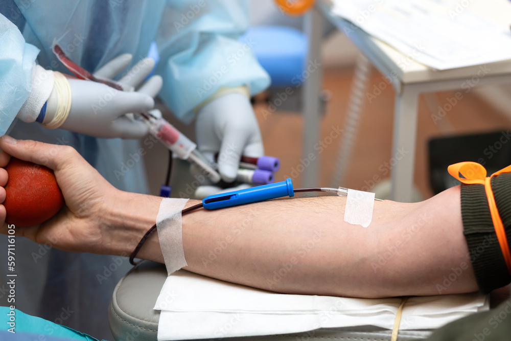 man donor for bone marrow donation blood in laboratory. male hand ...