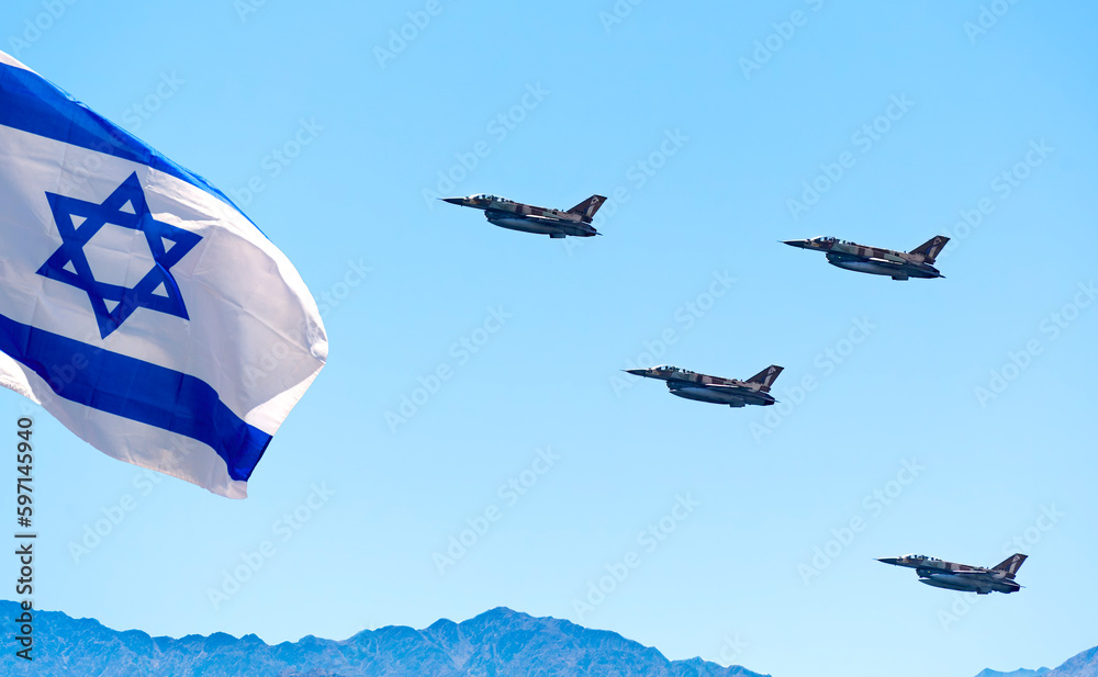 Waving Israeli Flag and Military Aircraft Show that takes part in air ...