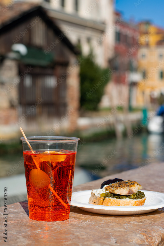Cocktail Aperol Spritz with olive and Venetian traditional bruschetta ...