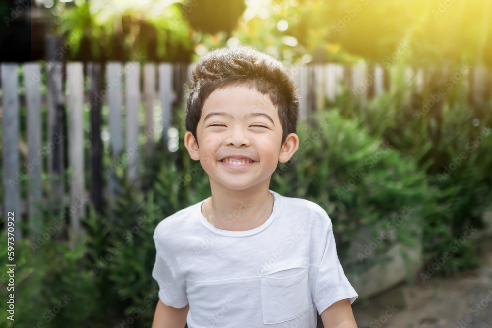 Happy Little Asian boy Kid showing front teeth with big smile and laugh ...