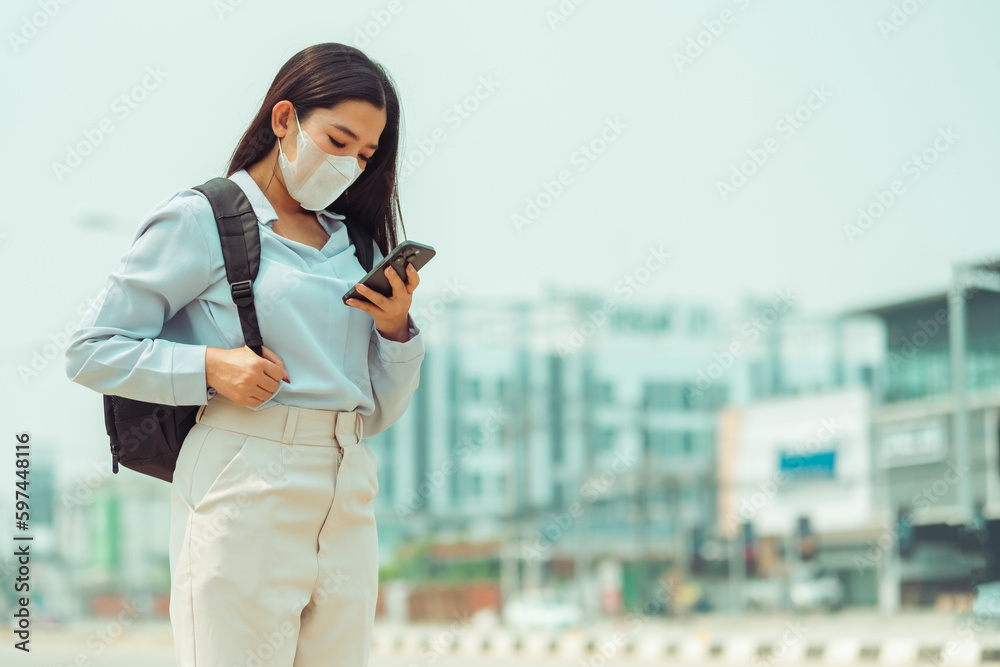Asian Women wearing Protection Mask feels headaches and cough due to ...