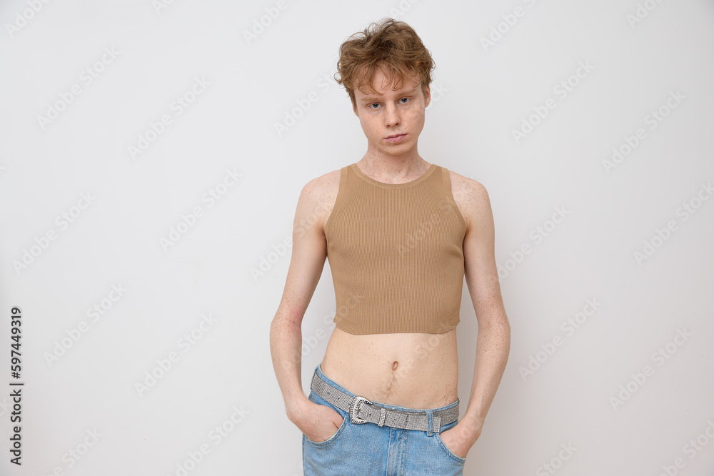 Horizontal portrait of proud non-binary red head person posing with ...