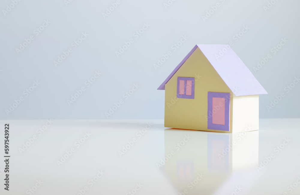 little paper house on white background Stock Photo | Adobe Stock