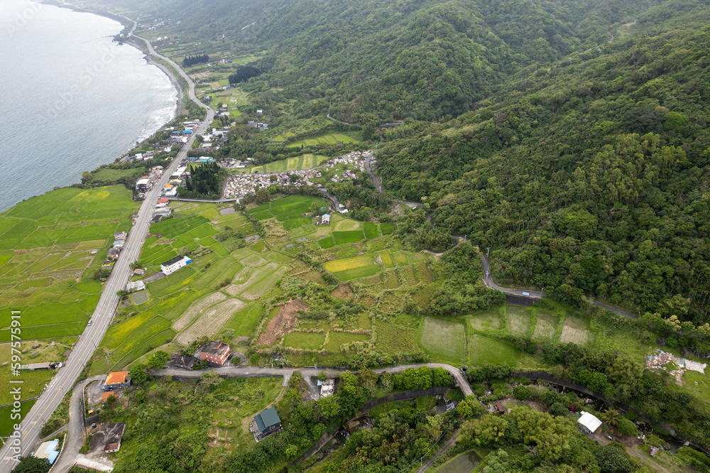 Dozens of rice terraces with a road running through next to the Pacific ...