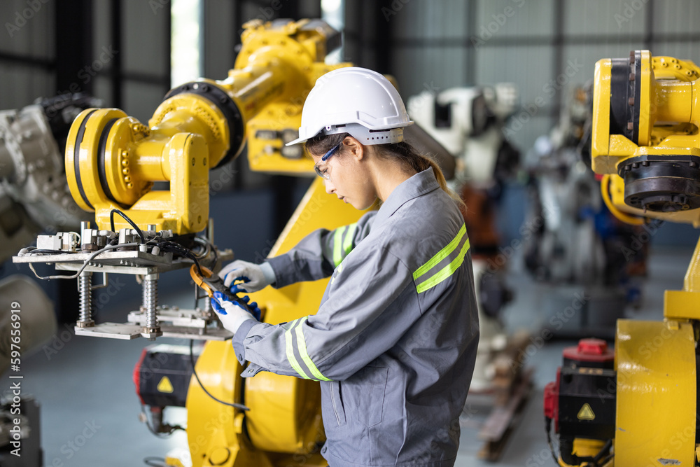 Robotic technicians tighten and loosen components with screwdriver and plier to perform safety ...