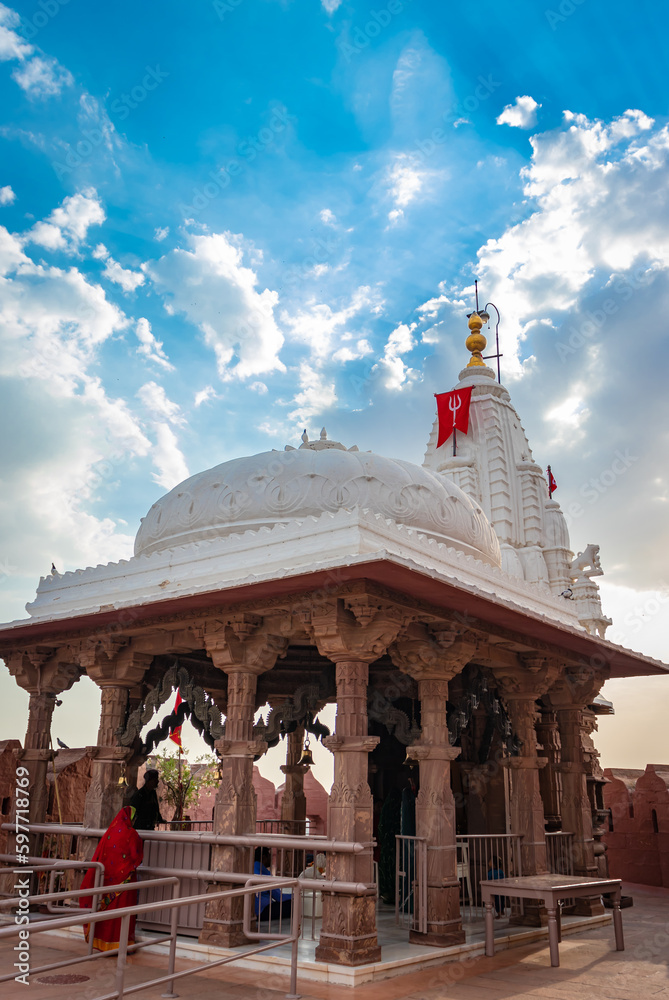 ancient temple with dramatic bright blue sunset sky at evening Stock ...