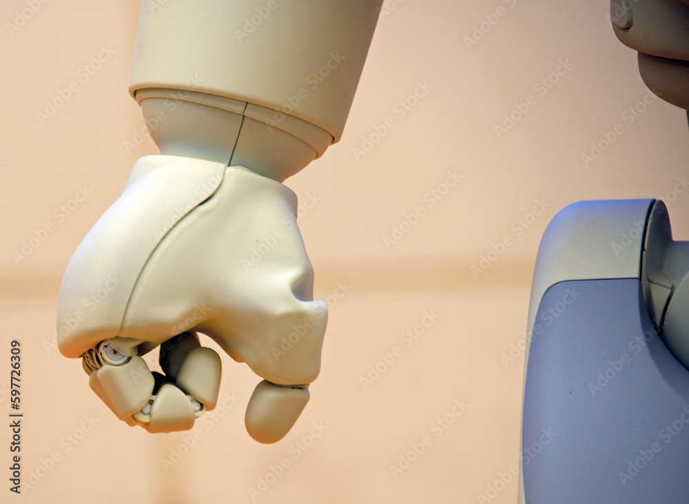 Honda's Asimo robot, close-up of right hand clenched into a fist, show ...