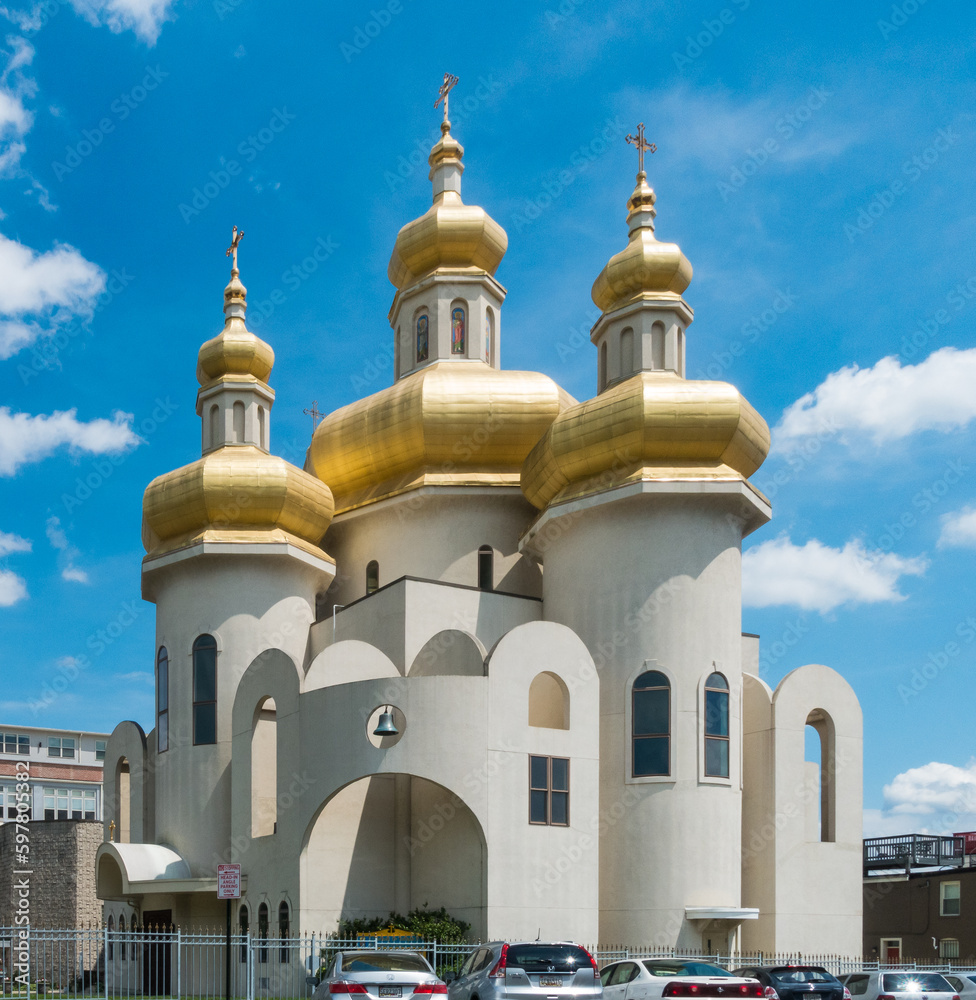 St. Michael the Archangel Ukrainian Catholic Church wih blue sky and ...
