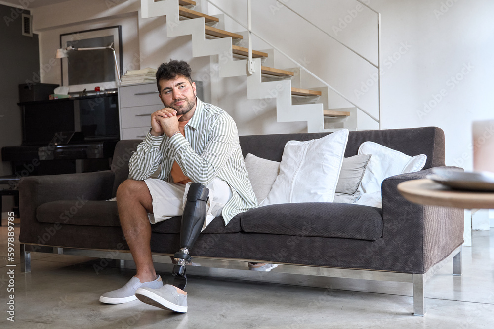 Thoughtful young pensive man amputee with prosthetic leg disability ...