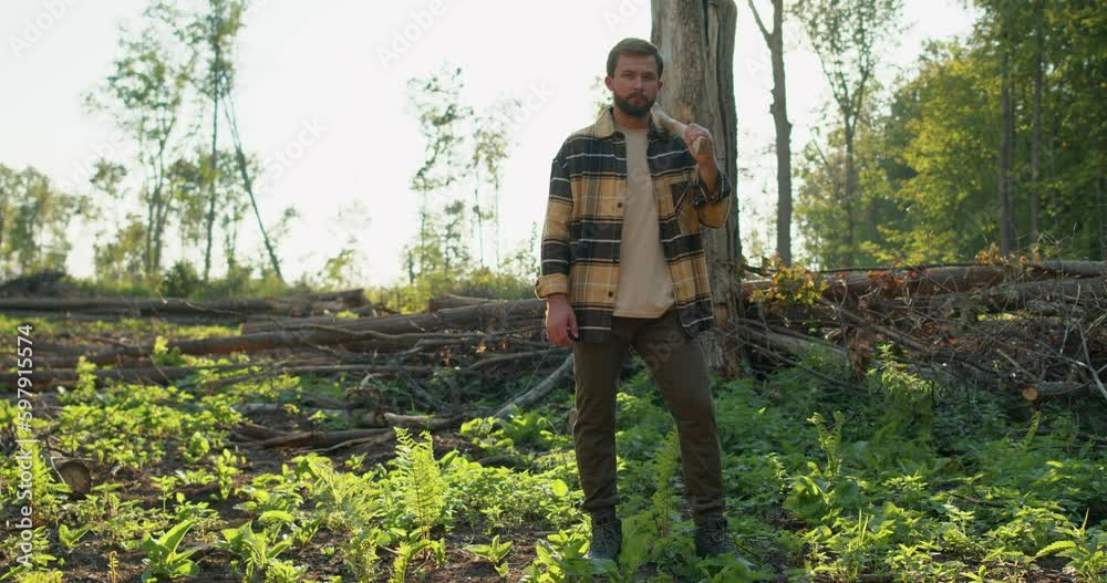 Vídeo do Stock: Logging season. Caucasian handsome tired Lumberman with ...