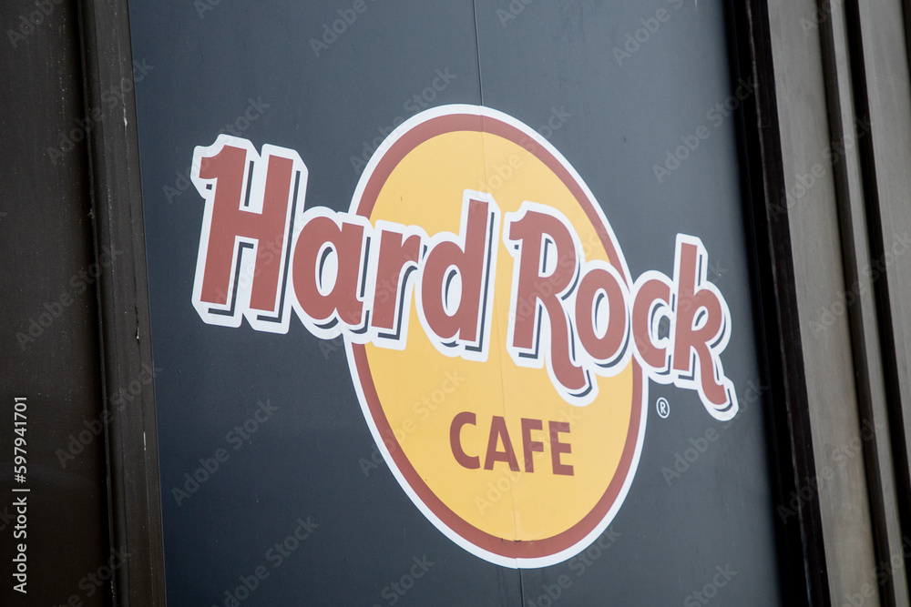 Hard Rock Cafe sign text on facade wall entrance with brand logo ...