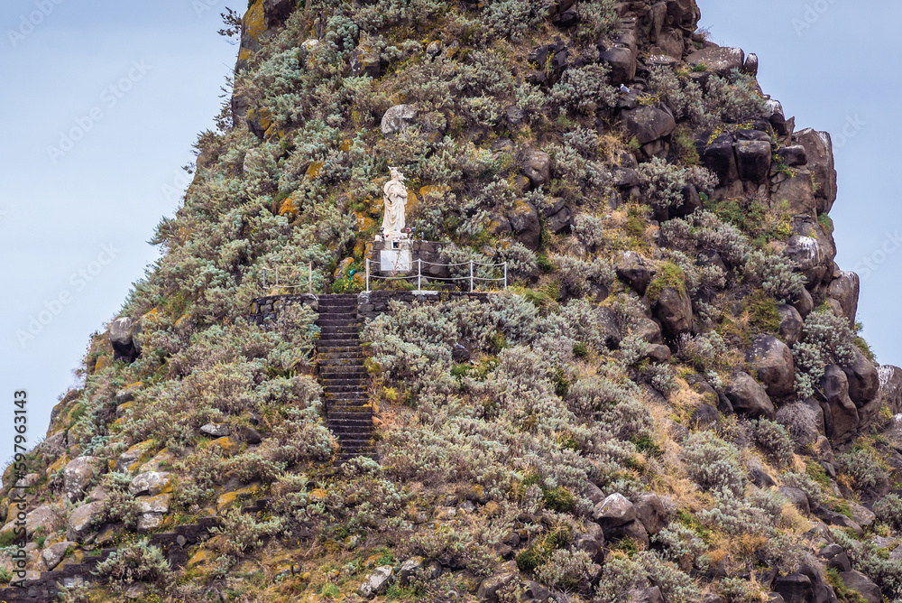 Our lady statue on one of the islets of Cyclopean Isles seen from a ...