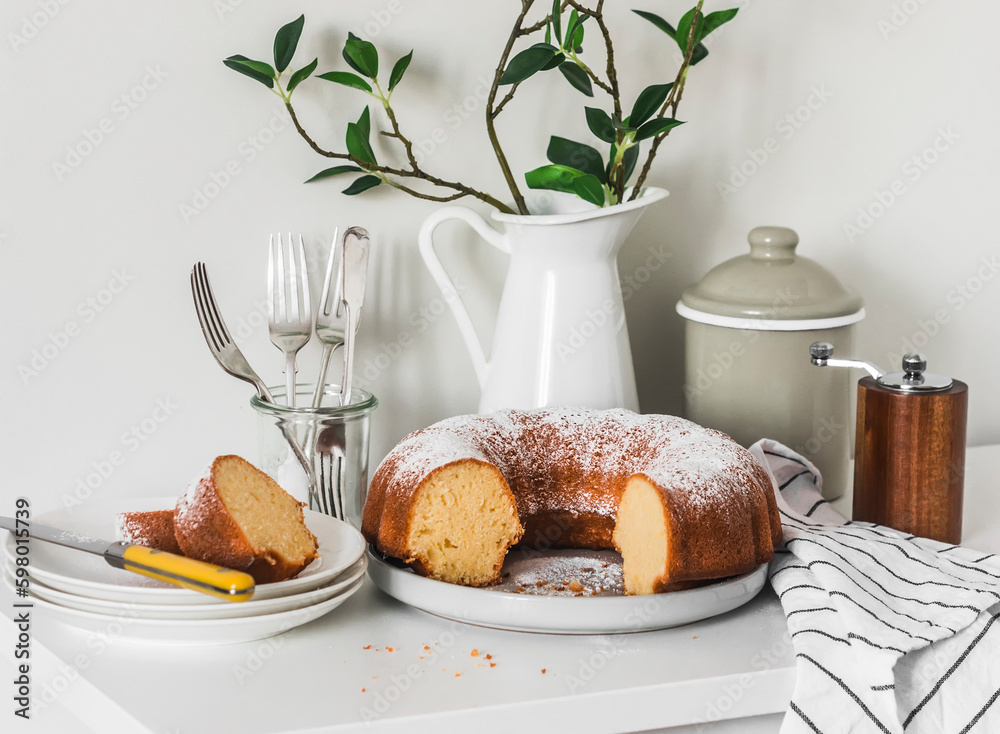 Classic pound english cake on a white table in a bright kitchen Stock ...