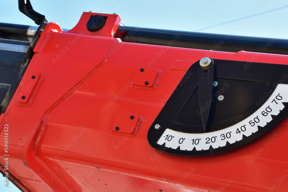 Boom angle indicator. Crane red boom with gravity angle finder. Stock Photo | Adobe Stock