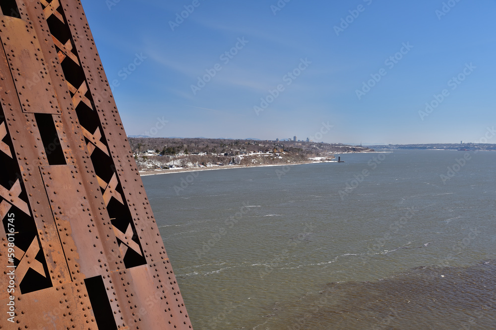 Saint Lawrence river viewed from the Quebec bridge. Riveted steel ...