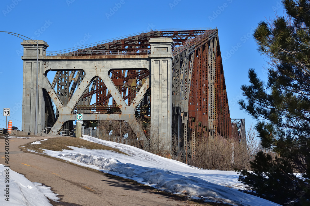 The Quebec Bridge is a riveted steel truss structure. Between Levis and ...