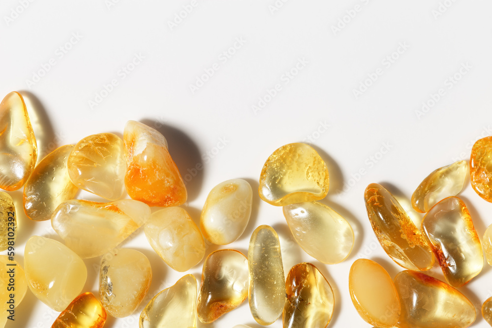 Natural gemstone amber texture background, light stones yellow ivory ...
