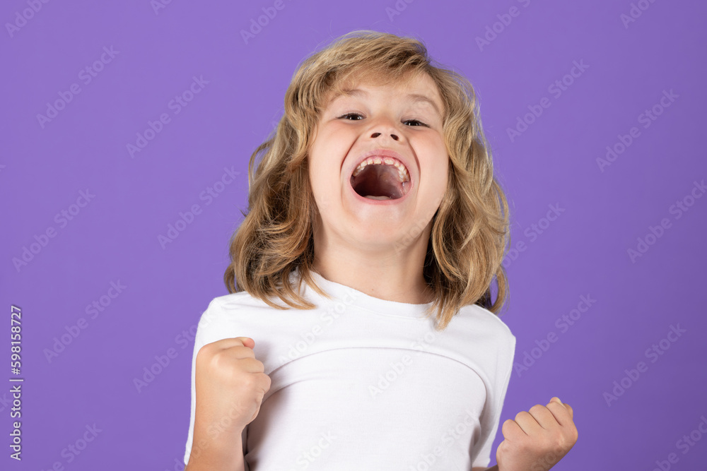Expression kids face. Excited kid boy on studio isolated background ...
