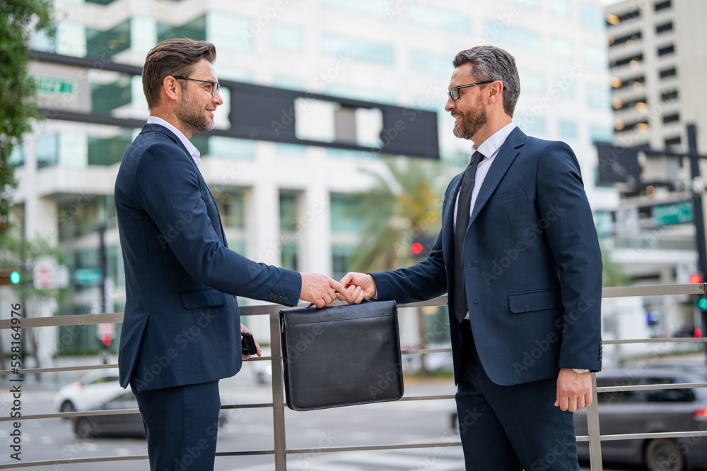 Business deal. Two business man hold business briefcase. Business ...