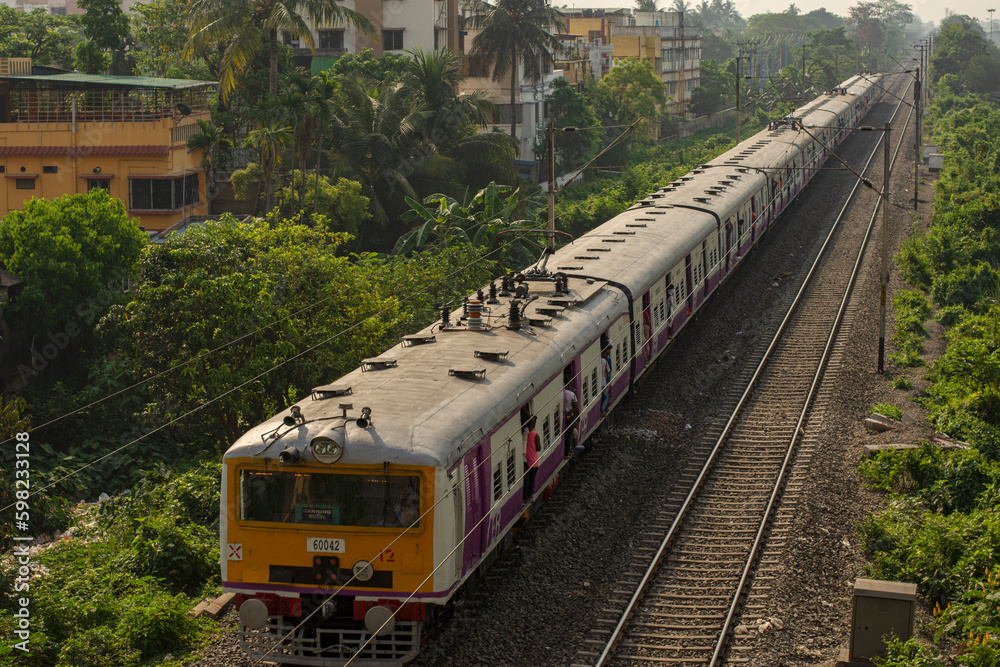 9th April, 2023, Kolkata, West Bengal, India: A local electric train on ...
