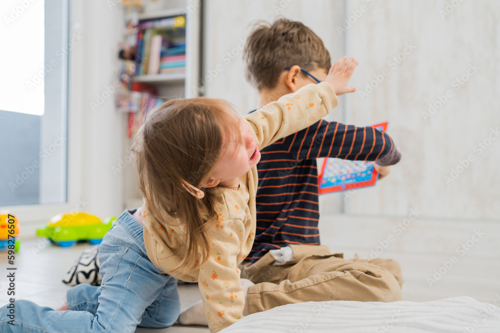 Two kids preschooler and toddler arguing about tablet toy, toddler girl ...