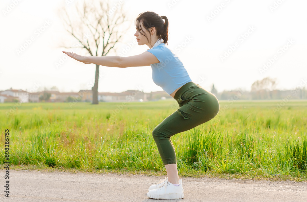 Fitness woman doing lunge exercises to train leg muscles. Active girl ...