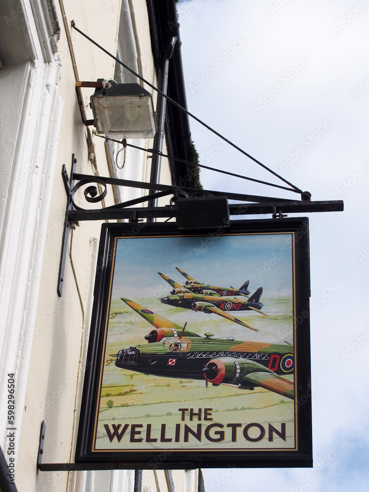 sign with world war 2 bomber aircraft over the wellington pub in ...