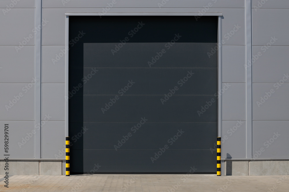 Industrial grey roller shutter door for loading dock in factory ...