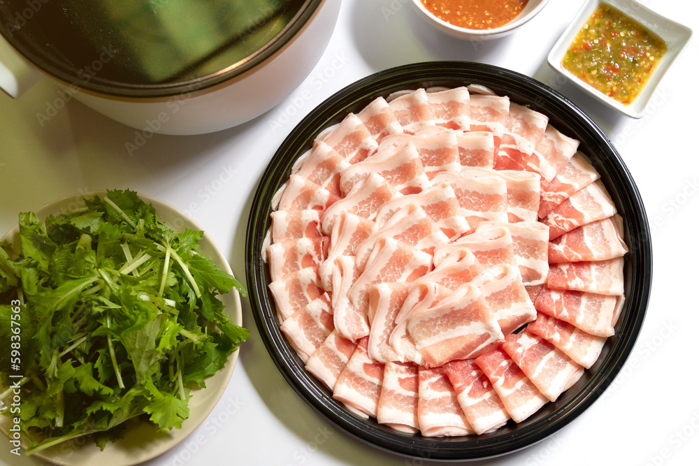 Premium slices Kurobuta (Black Pig) pork with high-marbled texture on ...