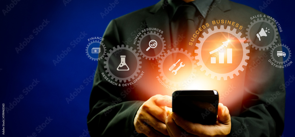 Businessman showing virtual screen of gear cog icon present operation management involving ...