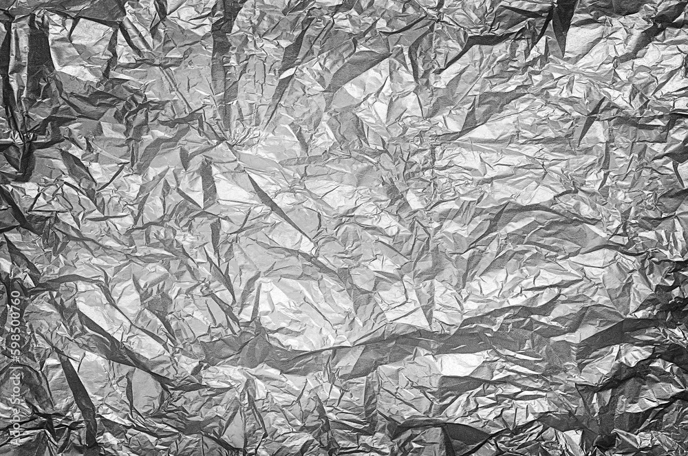 Crumpled silver paper texture background. Black and white tone. Stock ...