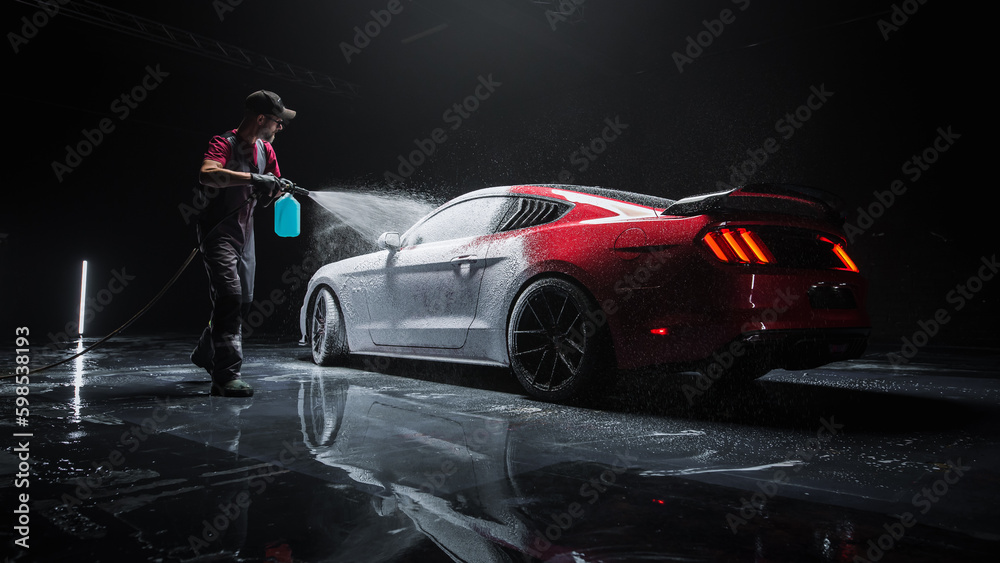 Car Wash Detailer Spraying Smart Foam to Clean the Exterior of a Tuned ...