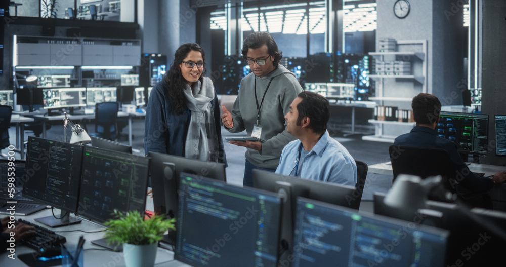 Stockfoto Group of Three Young Indian Software Engineers Use Computer ...