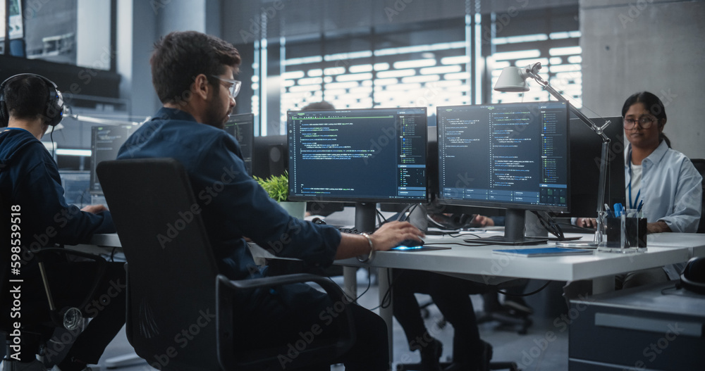 Team of Talented Young Indian Professionals Working in a Technological ...