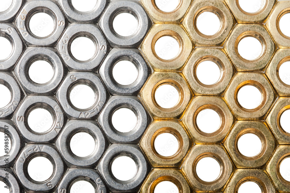 Metallic hex nuts layed out in a hexagonal pattern, industrial ...