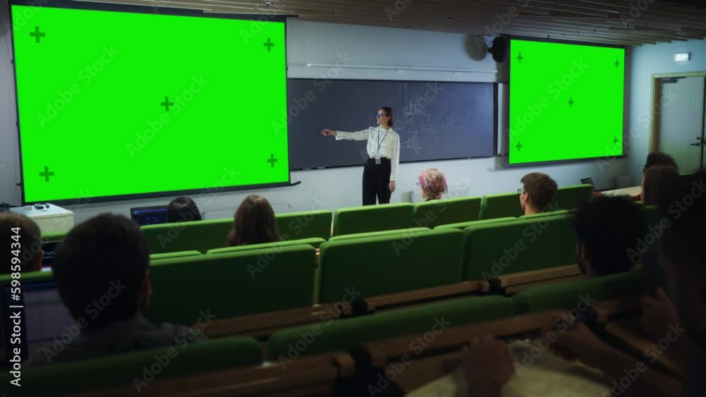Young University Professor Giving a Lecture, Pointing on a Green Screen ...