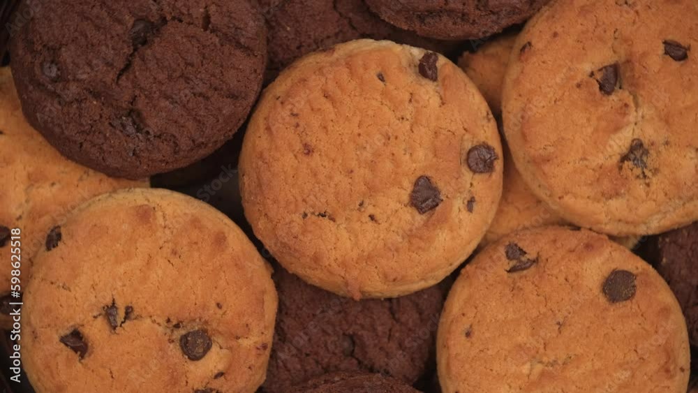 top view of rotation of various chocolate cookies made of cocoa powder ...