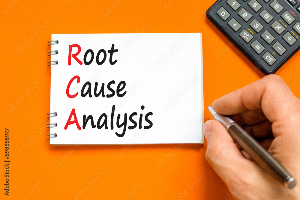 RCA root cause analysis symbol. Concept words RCA root cause analysis on white note. Businessman ...