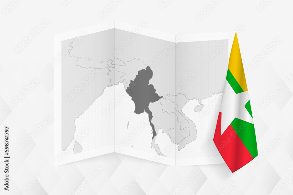 A grayscale map of Myanmar with a hanging Myanmar flag on one side ...