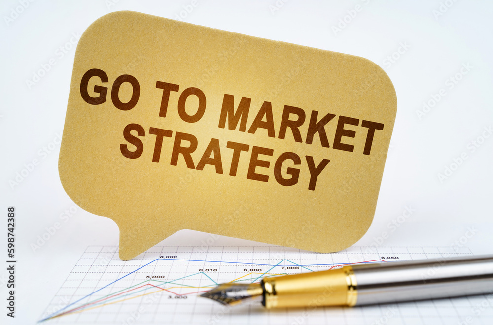 On the business diagram is a pen and a sign with the inscription - Go ...