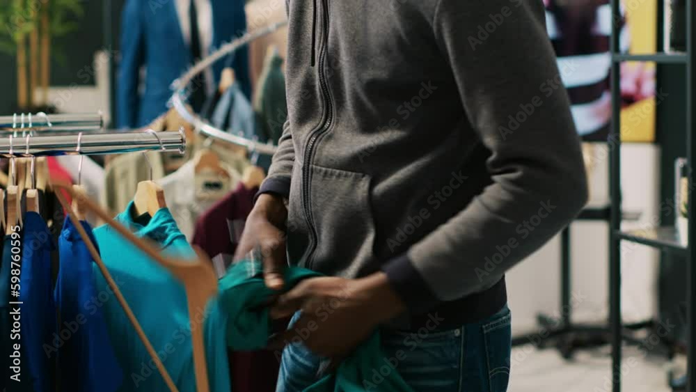 African american thief was caugh robbing store by asian bodyguard ...