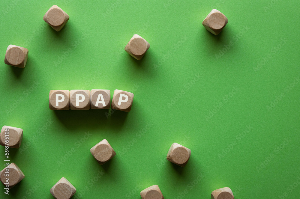 There is wood cube with the word PPAP. It is an abbreviation for PPAP as eye-catching image ...