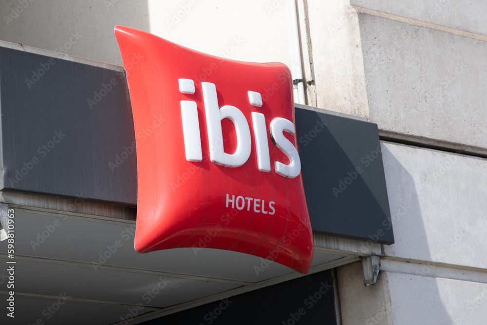 ibis sign logo and brand text hotel wall facade entrance french chain ...