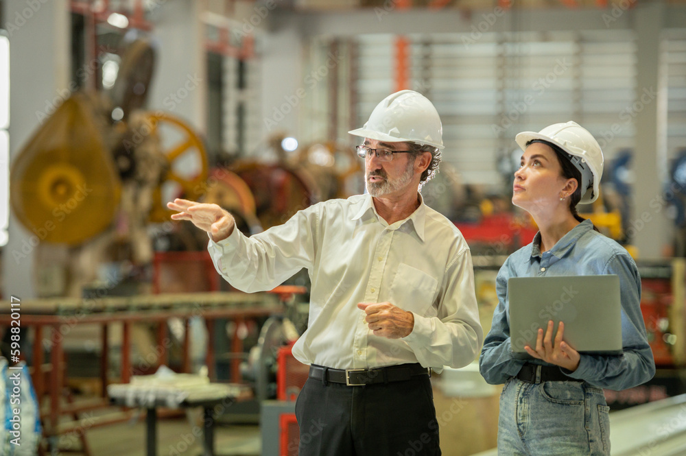 partner woman engineer assistant in helmet inspection check heavy ...