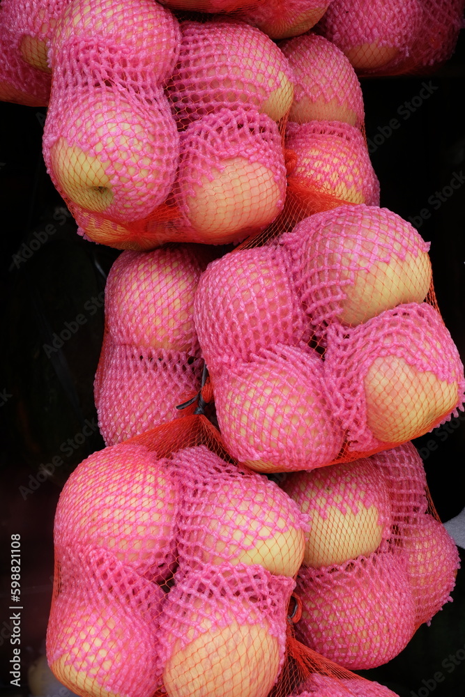 fuji apples at the fruit stand. Fuji apples are an apple cultivar ...