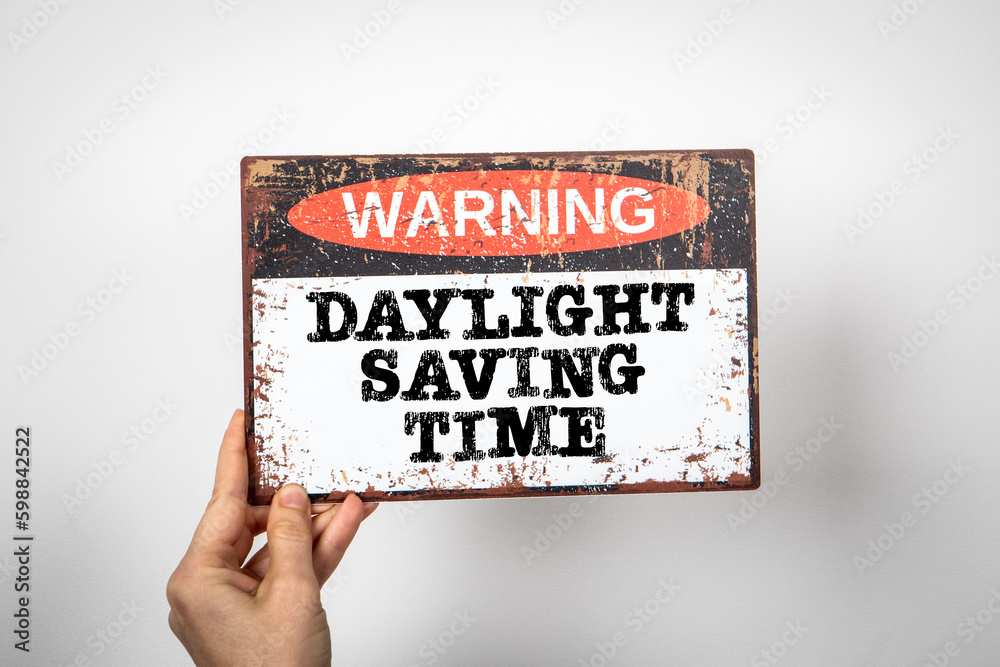 Daylight Saving Time. Warning sign with text on a white background ...