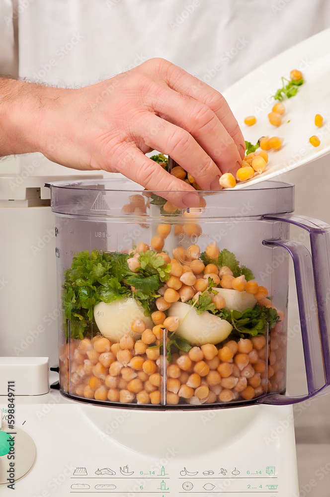 Falafel ingredients put into a food processor or blender to make dough ...